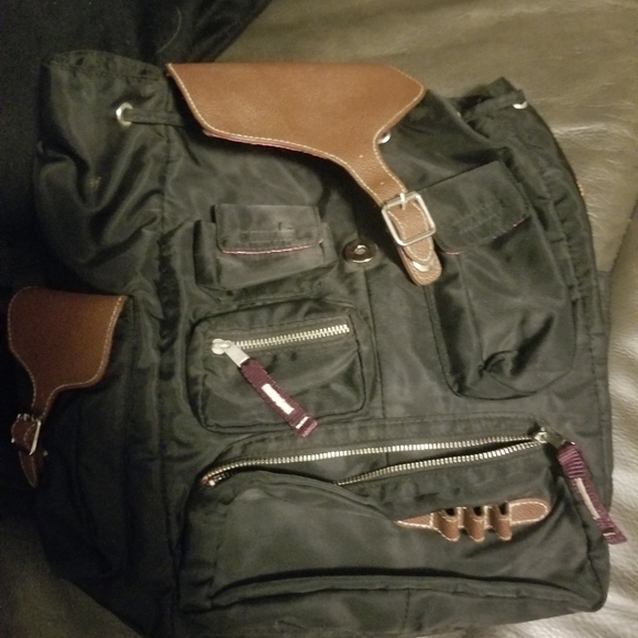 Bags | Sling Backpack With Sideback Zipper Opening | Poshmark